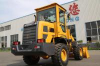 China Mini Articulated Wheel Loader 1500kg Rate Loading With Hydraulic Lifting System for sale