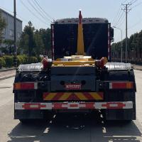 China 31 Ton Capacity Pure Electric Hook Lift Garbage Truck with 256 km Range and Detachable Container for sale