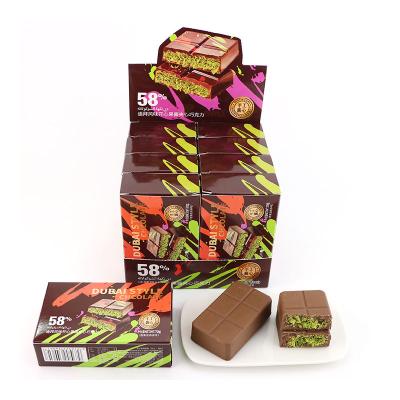 China Dubai Style Pistachio Paste Chocolate Solid 70g Chocolate Bar Ball Shape Chocolates for sale