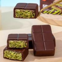 China Dubai Style Pistachio Paste Chocolate Solid 70g Chocolate Bar Ball Shape Chocolates for sale