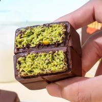 China Dubai Style Pistachio Paste Chocolate Solid 70g Chocolate Bar Ball Shape Chocolates for sale