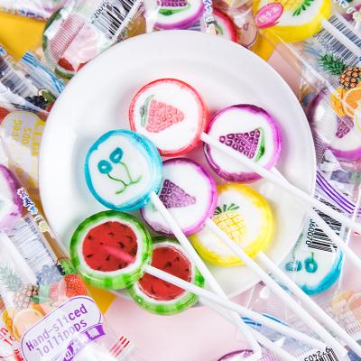 China Assorted Fruit Flavor Hard Stick Candy Wholesale High Quality Sliced Lollipop Candy for sale