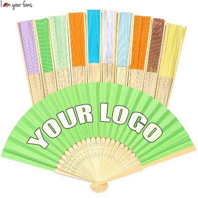 China Promotional Customized 23cm Polyester Cotton Bamboo Hand Folding Fan Beautiful Outdoor Dance Wood Craft Painted Bamboo Hand Fan for sale
