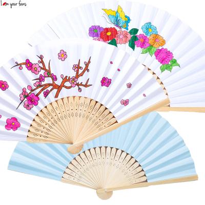 China Personalized Pattern Carving Bamboo New Year Fan Hand Fans Diy Paper Fans for sale