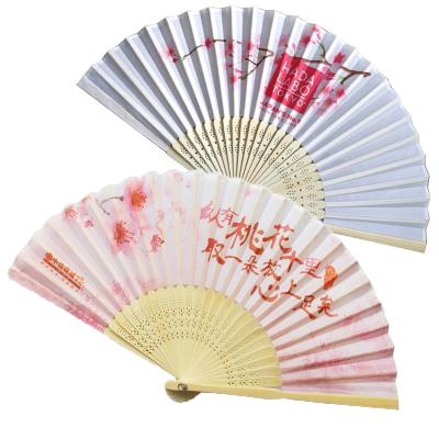 China Custom Promotion 21cm 23cm Bamboo Fanric Paper Wedding Foldable Hand Fans for Promotion and Gift for sale