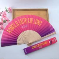 China 23cm Stock  Wooden Polyester Contton Wood Handle Folding Fan for Spain Market Promotion for sale