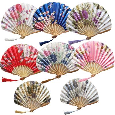 China Hot Selling Seashell Flower Hand Fan Foldable Wedding Fabric Bamboo Fan for sale