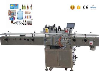 China Automatic fix - point sticker round bottle labeler machine with turntable for sale