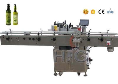 China TCG conveyor motor automatic round bottle labeling machine / sticker label machine for sale
