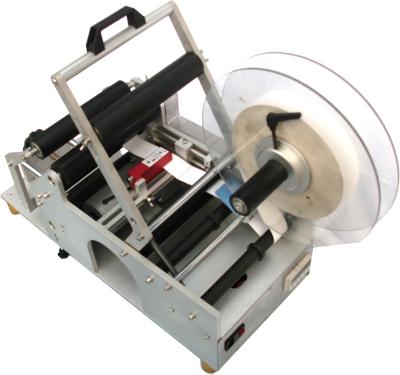 China Semi automatic table top bottle labeling machine / manual label applicator for sale