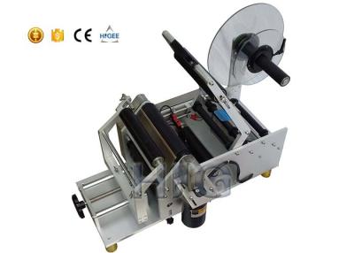 China Custom semi-automatic round bottle labeling machine with fixed position function for sale