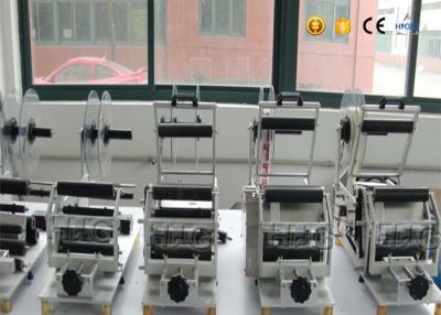 China Omron label stock electric eye self adhesive sticker semi automatic round bottle labeling machine with CE standard for sale