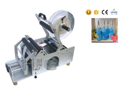 China Hand Honey Semi Automatic Round Bottle Labeling Machine Self Adhesive Sticker for sale