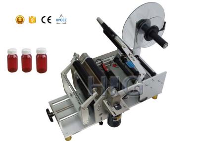China Shoe Polish Hand Semi Automatic Round Bottle Labeling Machine Self - Adhesive for sale