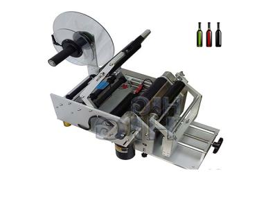 China Used round bottles hand  labeling machine stick semi automatic for sale