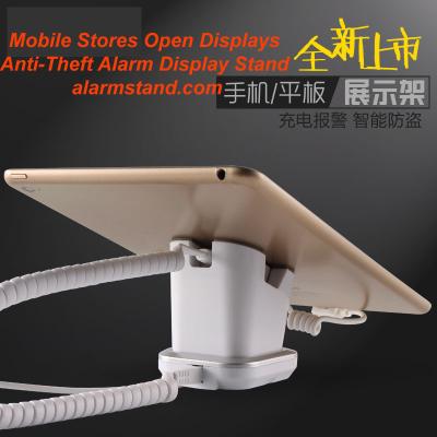 China COMER Powerful tablet counter display charging and alarm sensor stand, anti-theft devices for accessories stores for sale