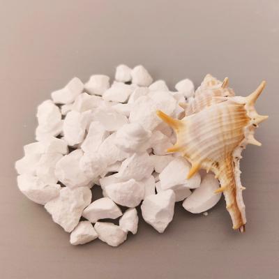 China 99% Alumina Tabular Sintering Alumina 5-10mm with 3.56g/cm³ Density for Refractory Applications for sale
