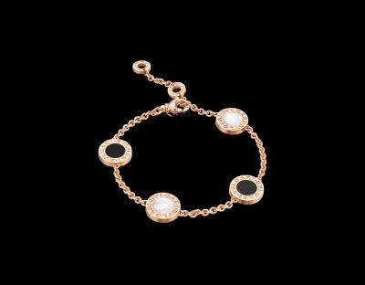 China bracelet in 18 kt pink gold with mother of pearl and onyx for sale