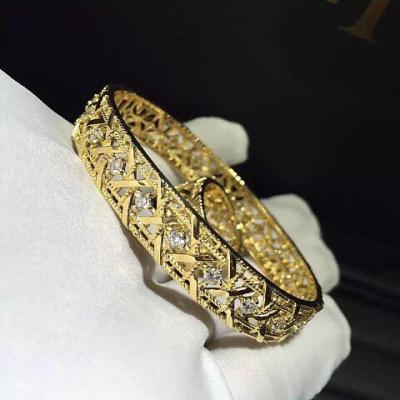 China Luxury Jewelry diamonds of rattan plaid bracelet  18kt gold  with yellow gold for sale