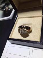 China Serpenti one-coil ring in 18 kt rose gold, set with pavé diamonds on the head. brand jewelry for sale
