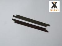 China 1.2Mm Thickness Ptfe Wearing Strip Shock Absorber Parts With Graphite Carbon Filler for sale