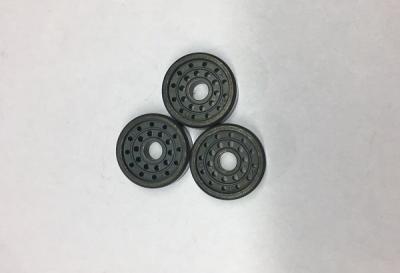 China Multiholes Oil Low Friction Coefficient PTFE Banded Piston With Hardness 60HRB for sale