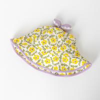China Floral Wavy Bound Cotton Children'S Bucket Hat with bow For Outdoor Sun Protection for sale