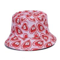 China Summer Heart Print Double-Sided Sunscreen Fisherman Hat For Women for sale