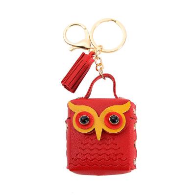 China Creative Mini Bag Cute Leather Owl leather Bluetooth Earphone bag for sale