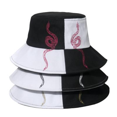 China Hip-Hop Snake Pattern Totem Bucket Hat Black And White Stitching Plaid Fisherman Hat for sale