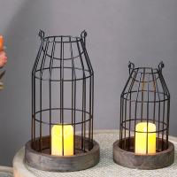 China Farmhouse Style Candle Lanterns Bottle Design Iron ART Style Candle Holder For Home Decor for sale