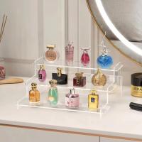 China Hot Selling 3-layer Transparent Cake Ladder Acrylic Riser Display Rack Transparent Perfume Jewelry Storage Rack for sale