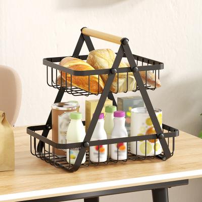 China 2-Tier Carbon Steel Fruit Storage Basket with Wooden Handles Home Decorative Kitchen Food Organization Wholesale for sale