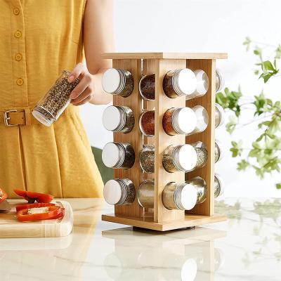 China Rotating Solid Wood Desktop Spice Rack for Kitchen Storage for Party Glass Bottles and New Model Spice Jars for sale