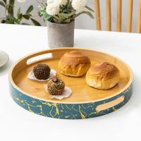China Home and Travel Use Rattan Storage Bamboo Tray Round Basket with Handle for sale