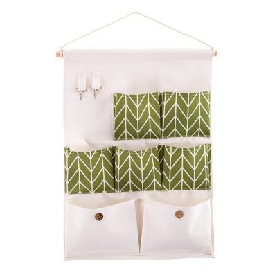 China 7-Pocket Wall Hanging Storage Bags Cotton Linen Door Waterproof Organizer for Home Office for Clothes Medical Kit Box Packing for sale
