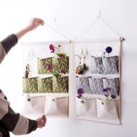 China 7-Pocket Wall Hanging Storage Bags Cotton Linen Door Waterproof Organizer for Home Office for Clothes Medical Kit Box Packing for sale