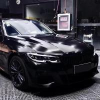 China Gloss Black Vinyl Car Wrap Film 1.52x17m Removable Adhesive for Vehicle Color Change for sale