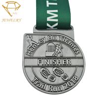 China Customized Embossed Silver Skating Sport Award Medals With Lanyard for sale