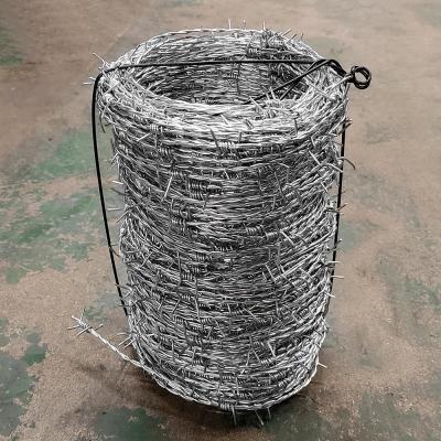 China 10 Gauge Galvanized Barbed Wire Fence Railways Highways Concertina Coil Wire for sale