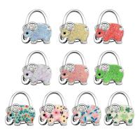 China Foldable Elephant Bag Holder Portable Metal Handbag Hook For Table for sale