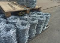 China Hot Dipped Galvanized Barbed Wire Reverse Twist 20cm Aperture for sale