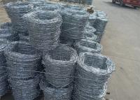 China Hot Dipped Galvanized Barbed Wire Reverse Twist 20cm Aperture for sale