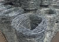 China PVC Coated Double Strand Barbed Wire Galvanized 2.51mm Silver Color for Farm Security for sale