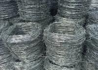 China Aluminum Alloy PVC Coated Barbed Wire Galvanized Steel Traditional Reverse Twist 2.51mm for sale