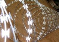 China Durable Concertina Razor Wire Single / Double Spiral Razor Wire Coil for sale