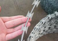 China Hot Dipped Galvanized Concertina Barbed Wire Coil BTO30 0.5mm Thickness 2.5mm Wire Diameter for sale