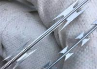 China Hot Dipped Galvanized Concertina Barbed Wire Coil BTO30 0.5mm Thickness 2.5mm Wire Diameter for sale