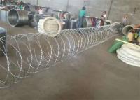 China Galvanized Concertina Razor Barbed Wire BTO22 0.5mm Thickness 2.5mm Wire Diameter for sale