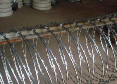 China Hot Dipped Galvanized Concertina Barbed Wire Coil BTO30 0.5mm Thickness 2.5mm Wire Diameter for sale